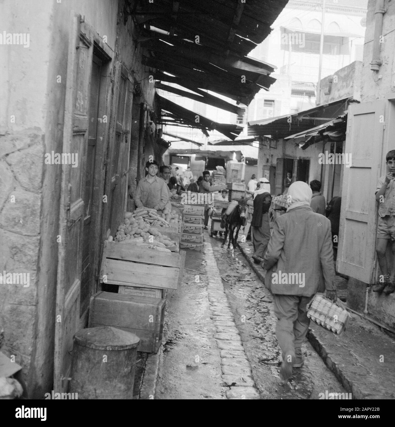 Israel: Nazareth Shopping street with shoppers, merchants and a donkey ...