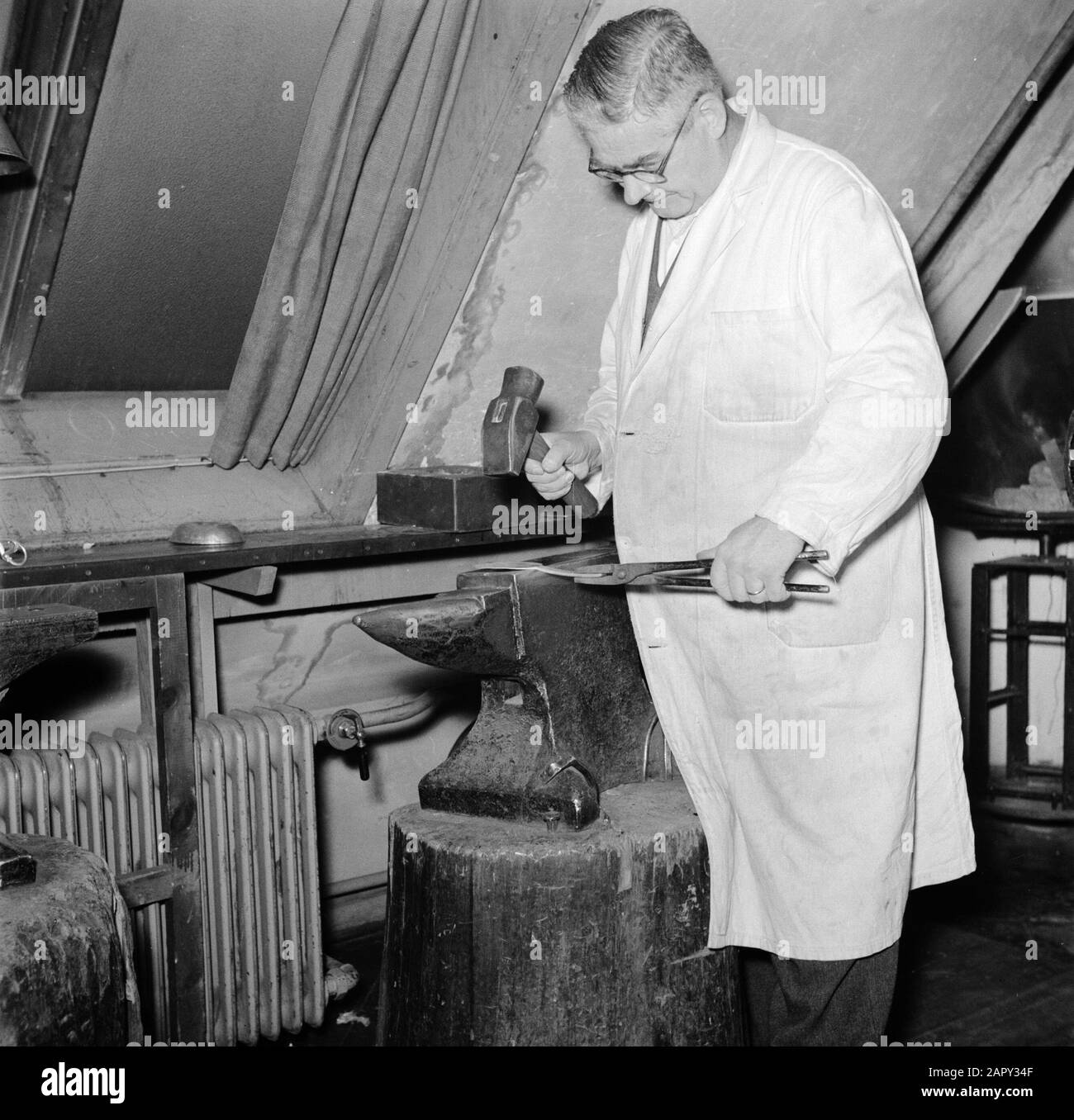 In the silversmith Georg Jensen Silversmith at work in the forge Date ...