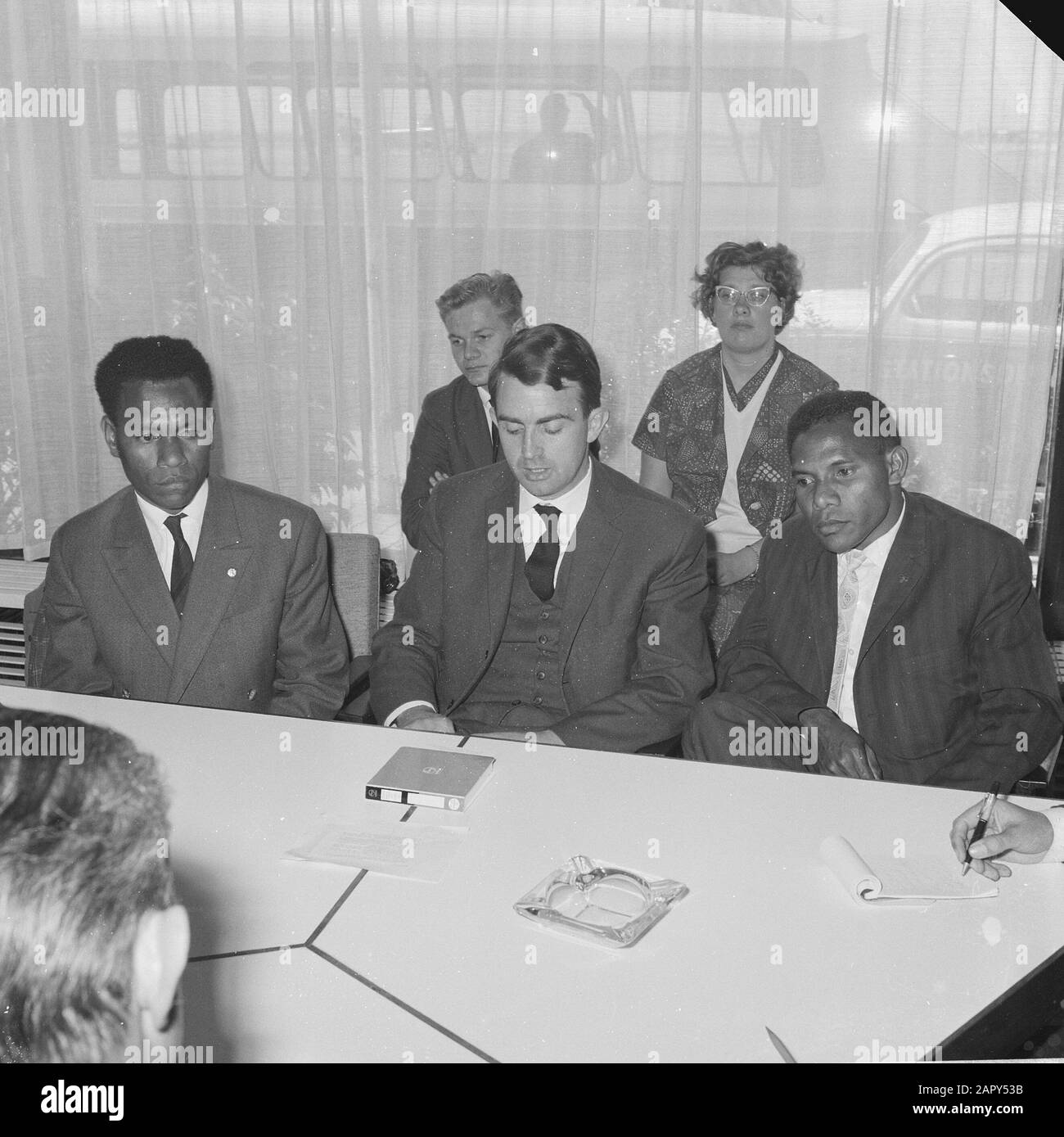 Papua students to New Guinea, left H.F. Wenna, M. Scholten and right ds ...
