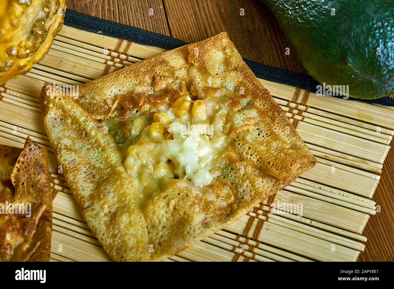 Zanzibar pizza, crispy pancakes with as many meats, sweets, or ...