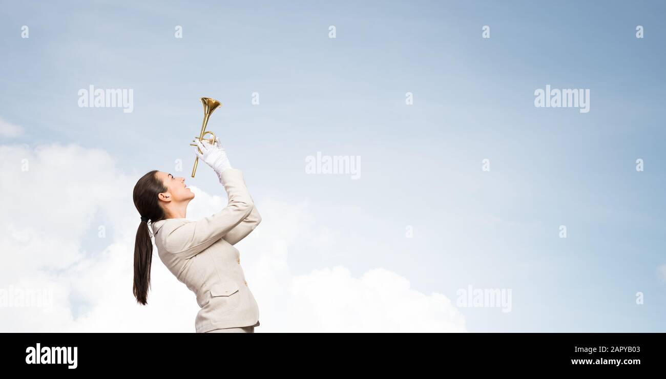 Young female trumpet player hi-res stock photography and images - Alamy