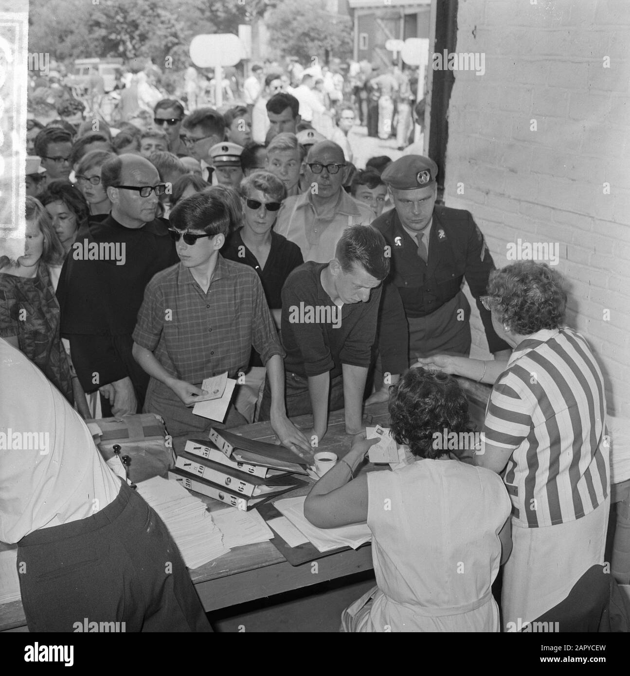 Registration booths Black and White Stock Photos & Images - Alamy