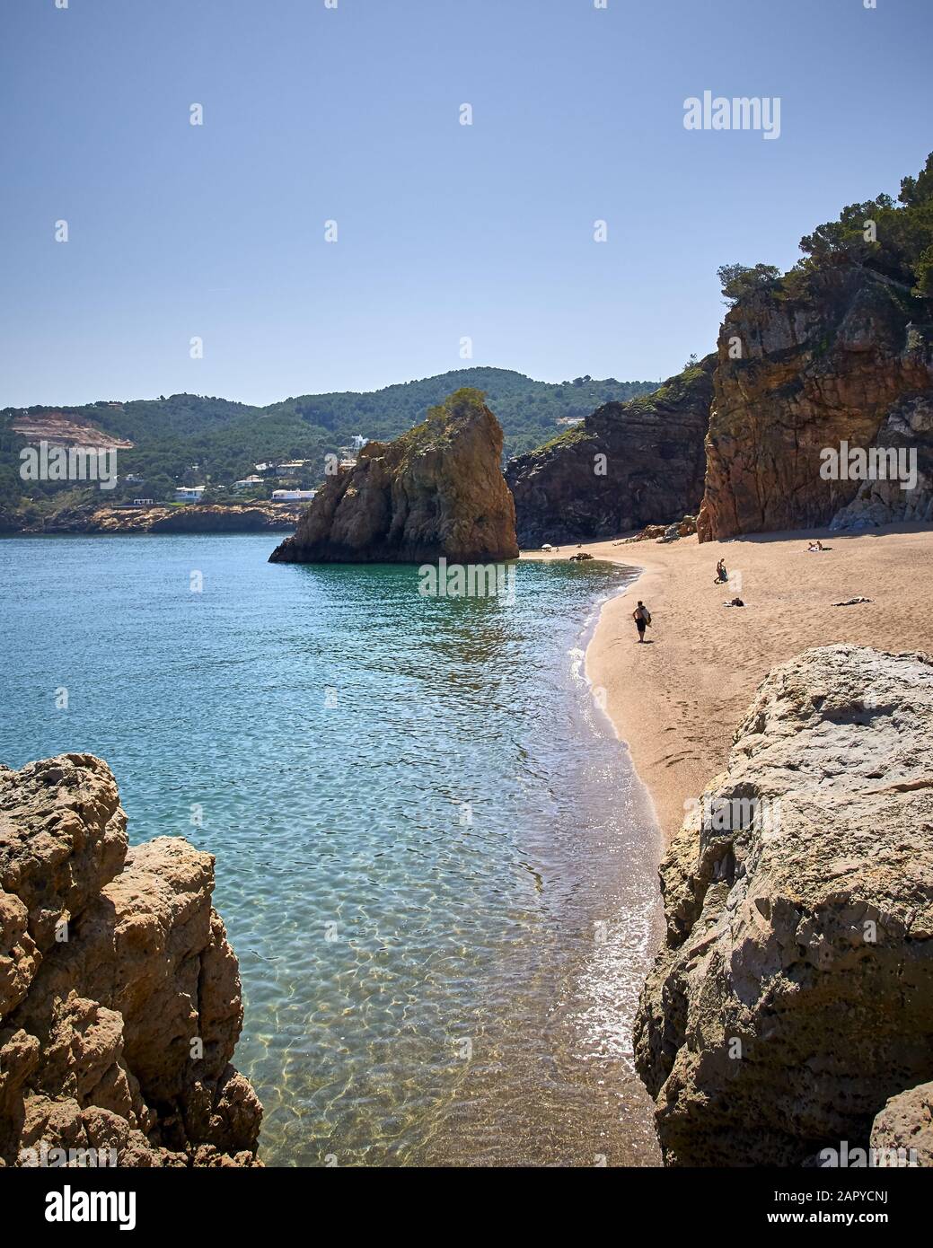 Vertical shot of the rocks on the shore of the sea at the Playa Illa ...