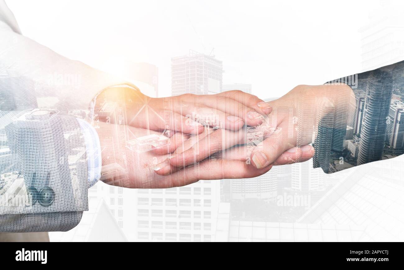 Concept of teamwork and unity with palms one on one in pile Stock Photo ...