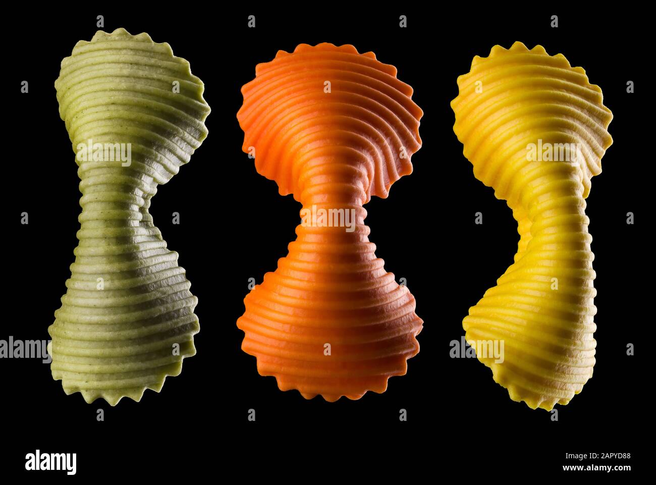 Set of colourful farfalle pasta isolated on black background Stock ...
