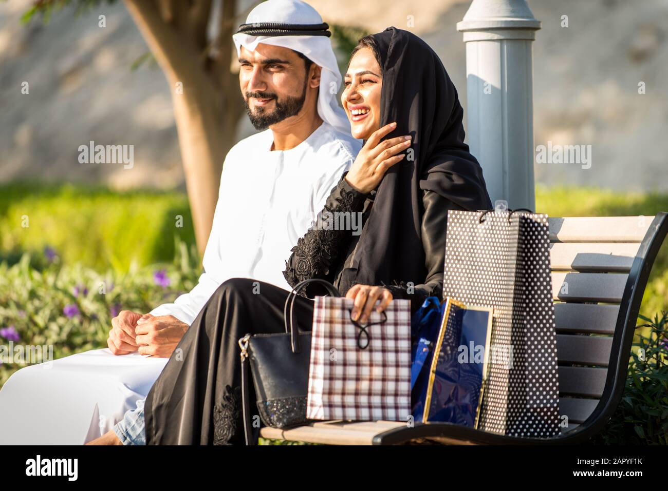 Beautiful middle eastern couple dating outdoors in Dubai - Married pair ...