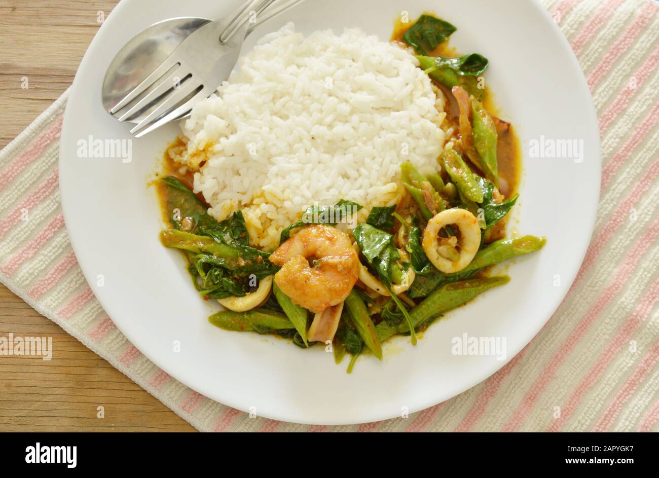 spicy stir fried prawn and squid curry eat couple with rice Stock Photo ...
