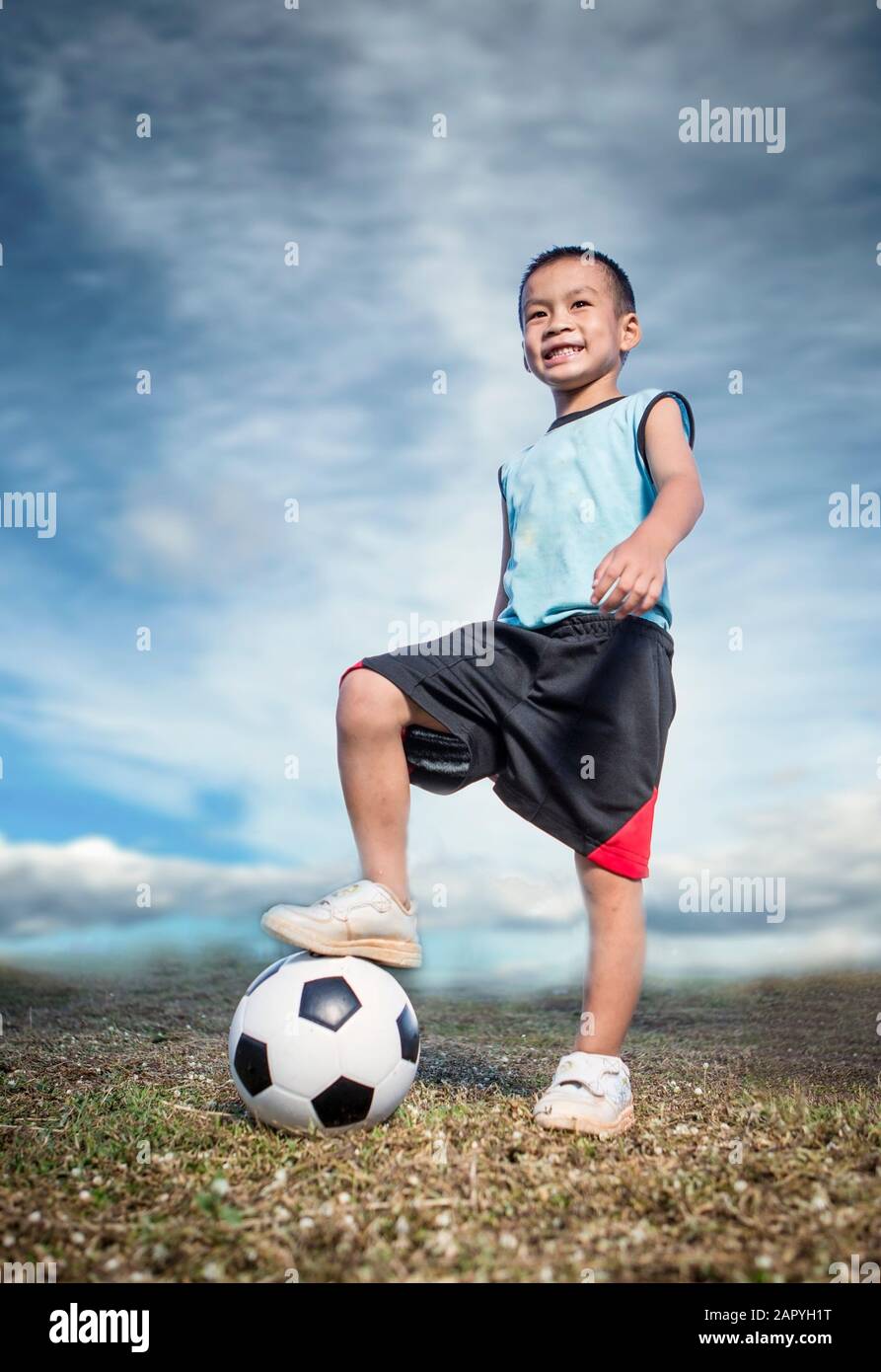 Child soccer player on soccer field Stock Photo - Alamy