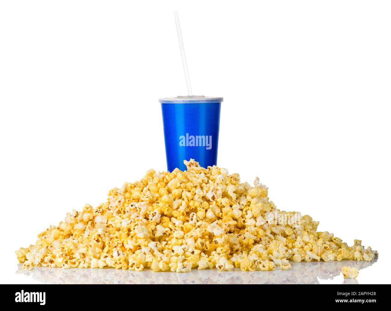 Cup of soft drink on a heap of popcorn isolated on white background ...