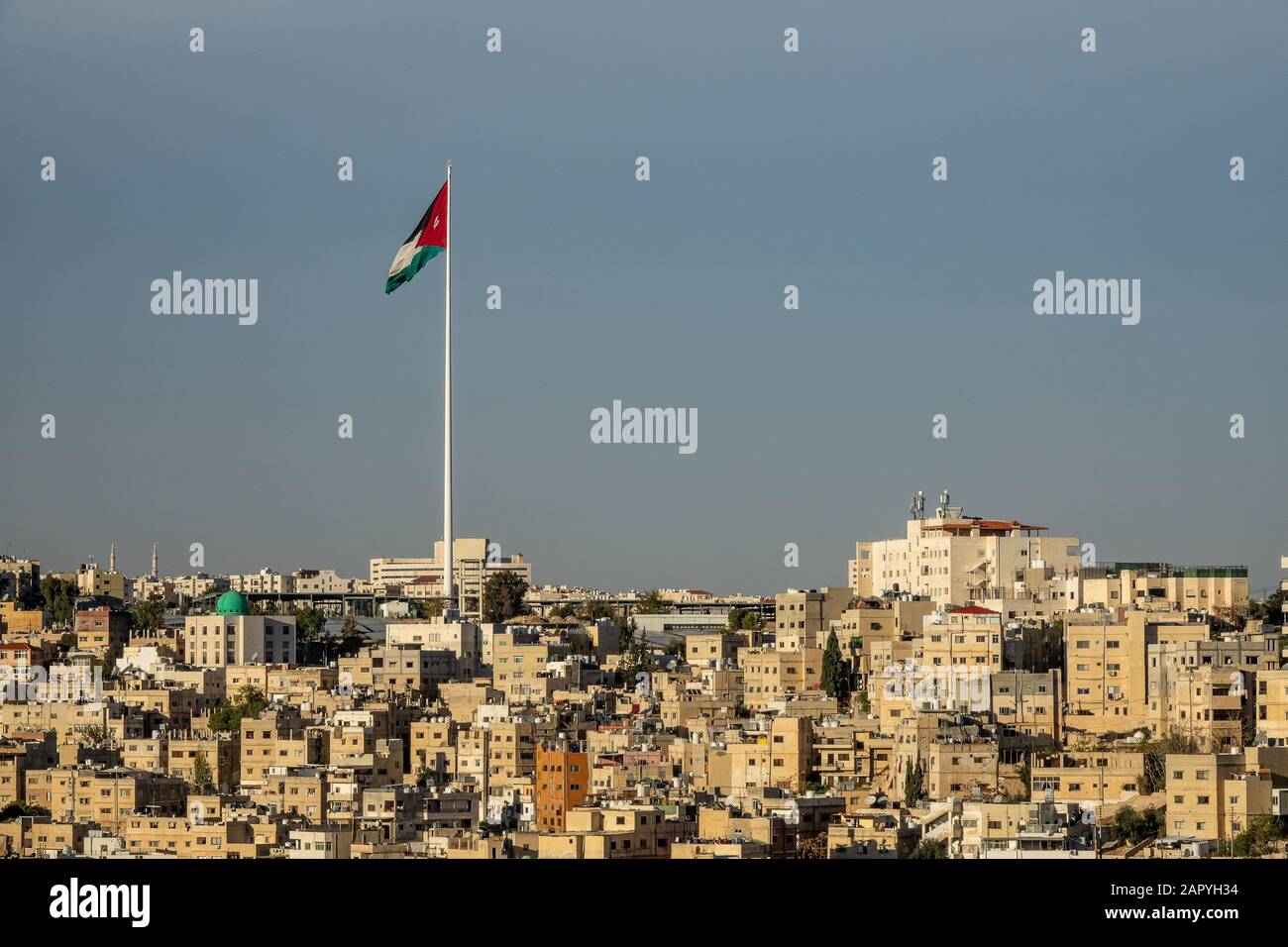 Light brown buildings of a city constructed in close vicinity to each ...