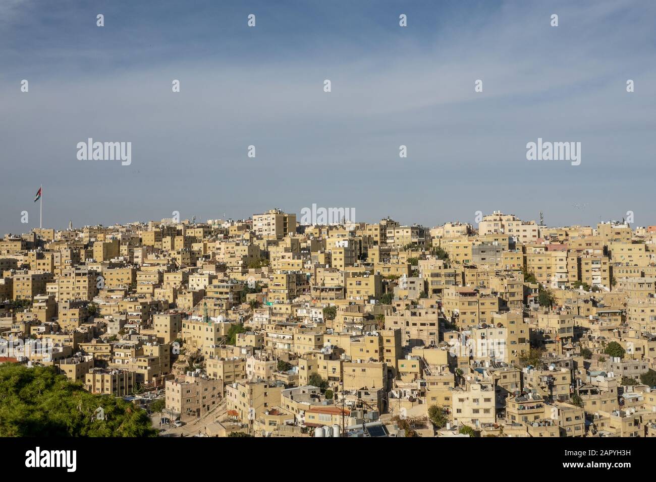 Light brown buildings of a city constructed in a close vicinity to each ...