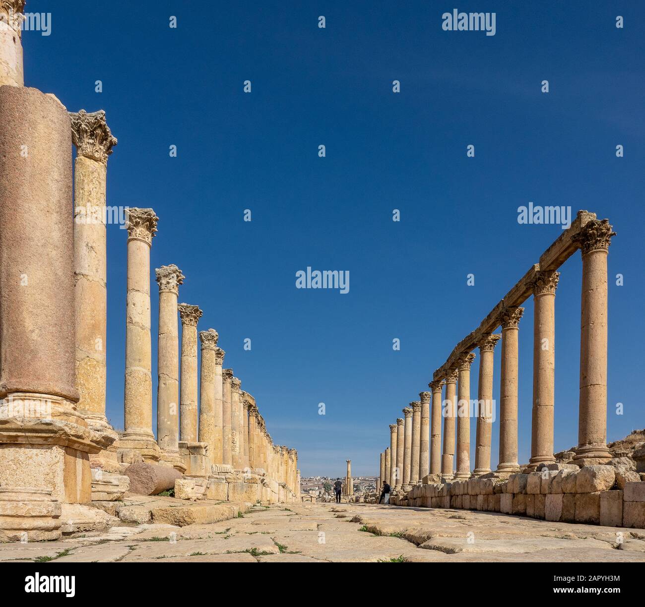 Wide angle shot of an ancient construction with towers in Jordan under ...