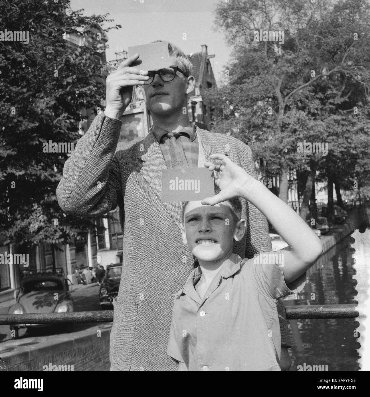 Watch solar eclipse by glass Date: October 2, 1959 Keywords: Solar ...