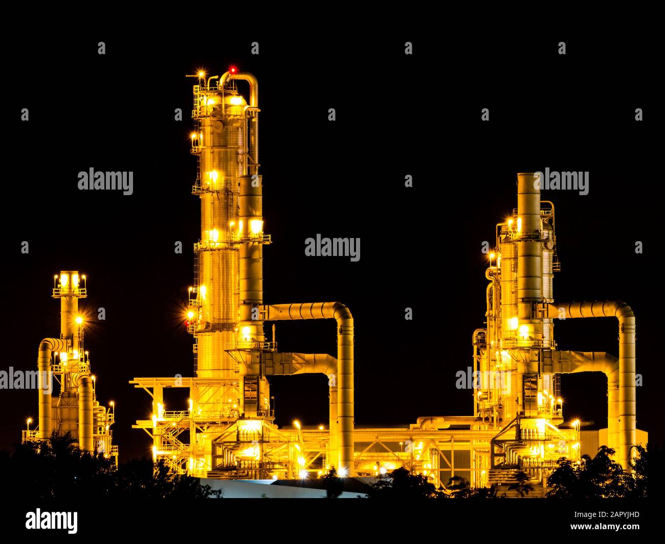 Oil refinery working at night Stock Photo - Alamy