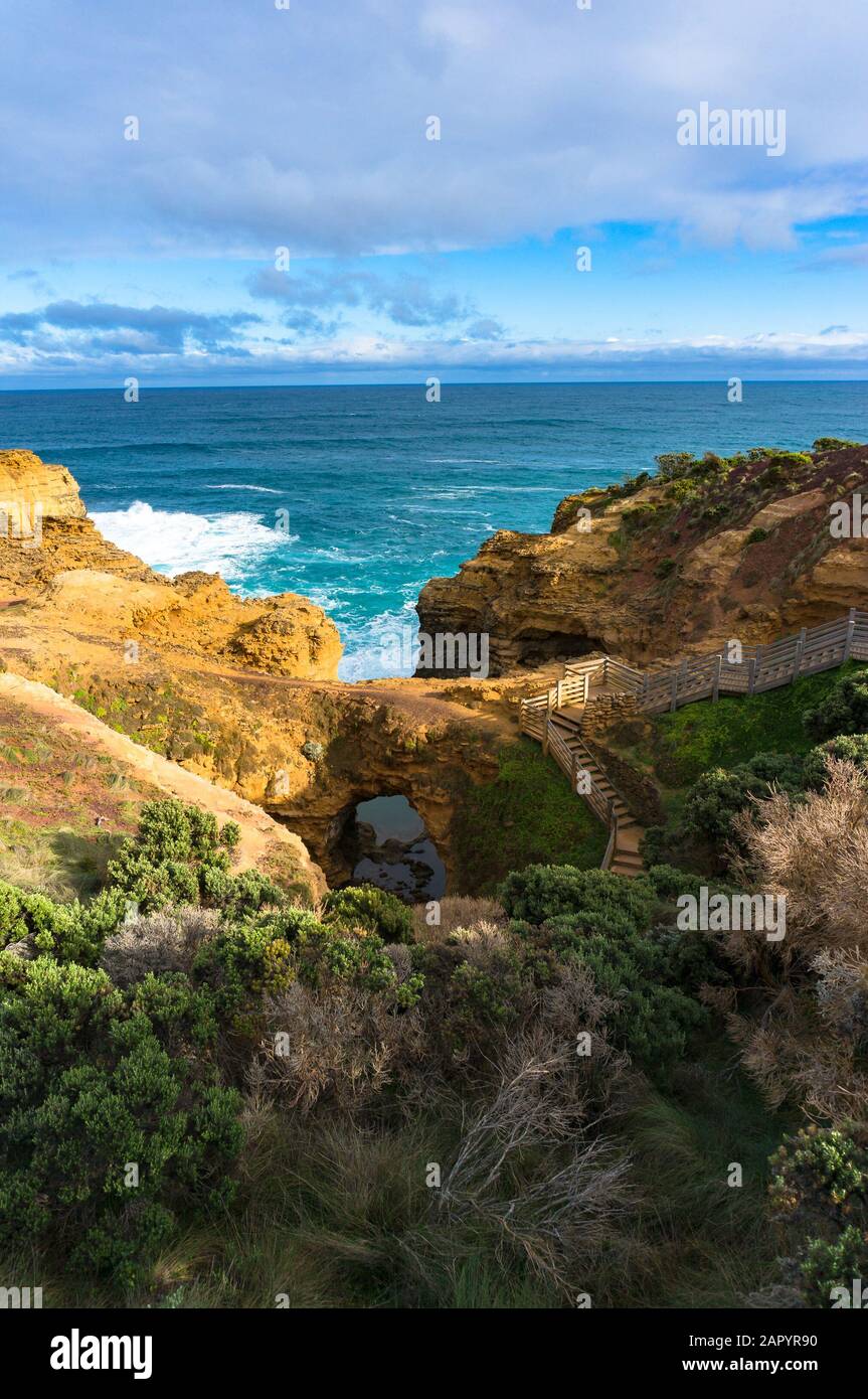 The Grotto rock formation with staircases and ocean view.Tourism in ...