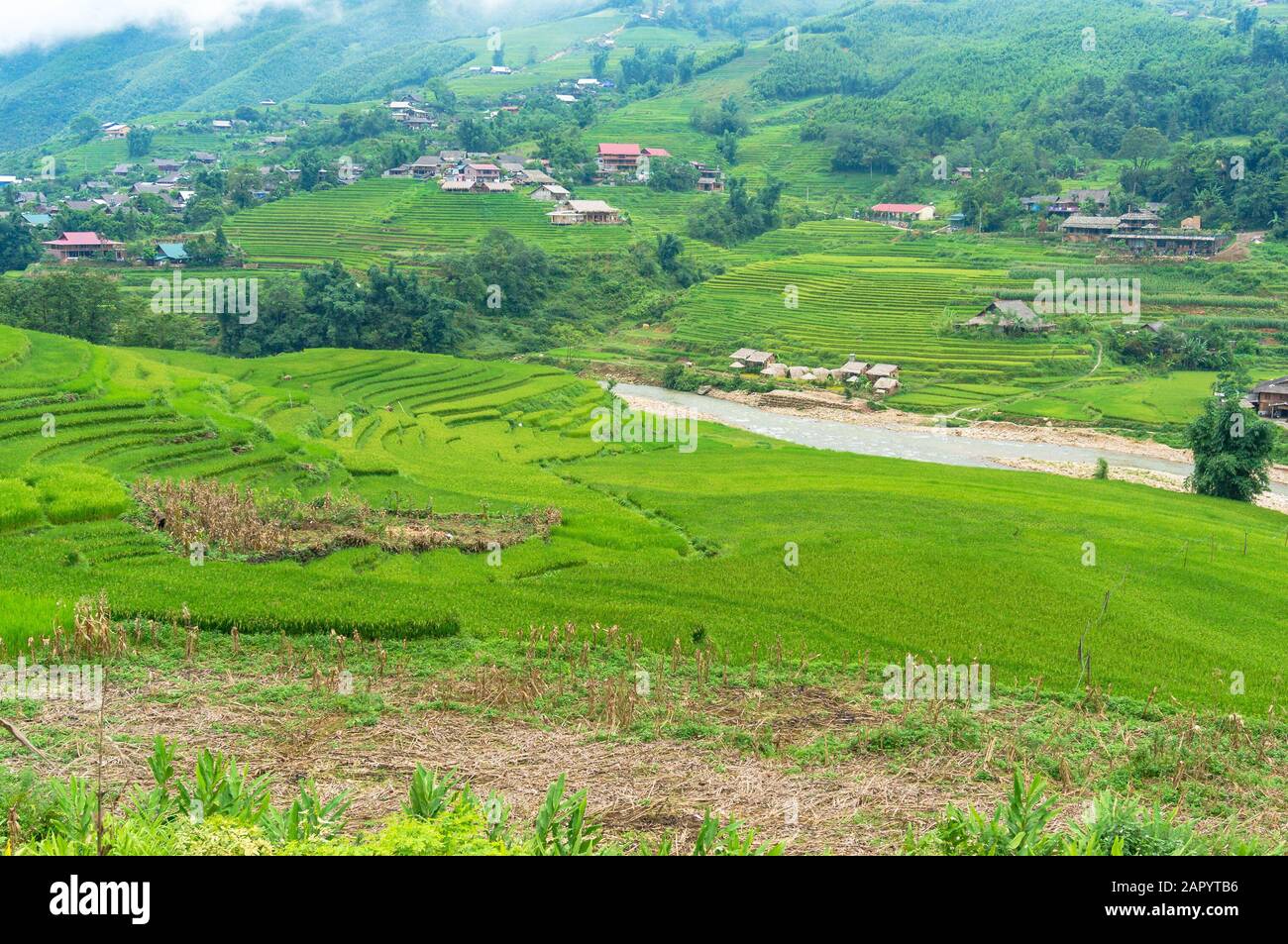 Countryside mountain landscape with rice terraces, river and villages ...