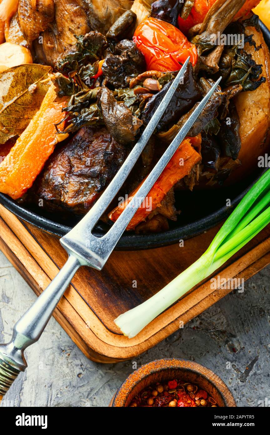 Delicious roast pork knuckle with vegetable.Traditional German cuisine ...