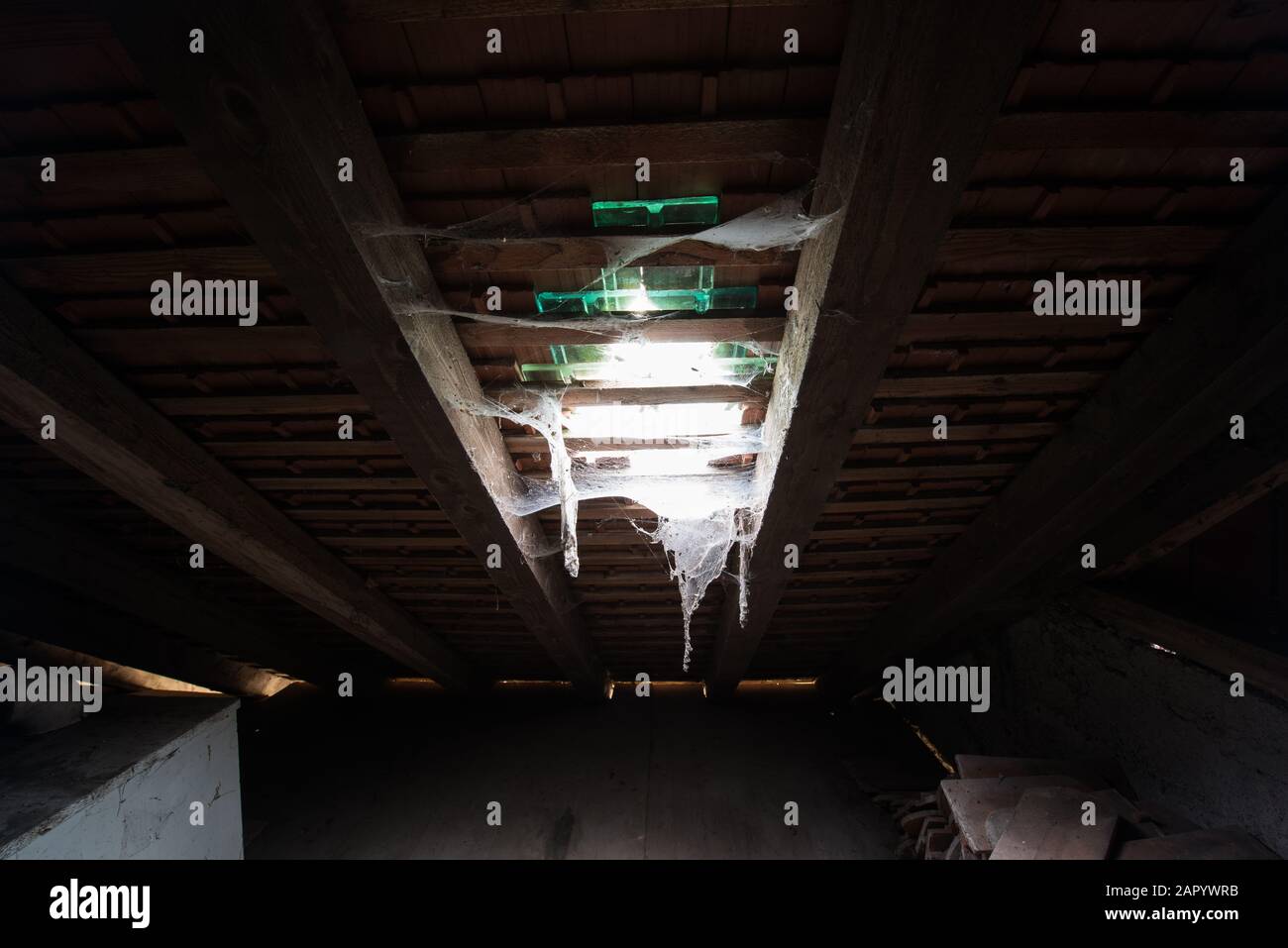 Inside the attic of an old house with cobwebs Stock Photo - Alamy