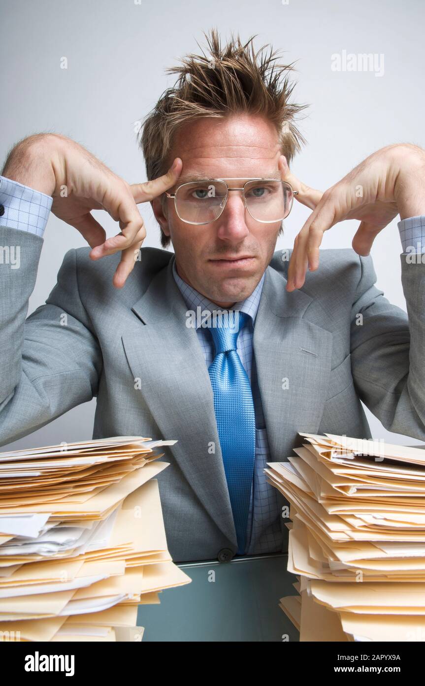 Disappointed businessman looking document hi-res stock photography and ...