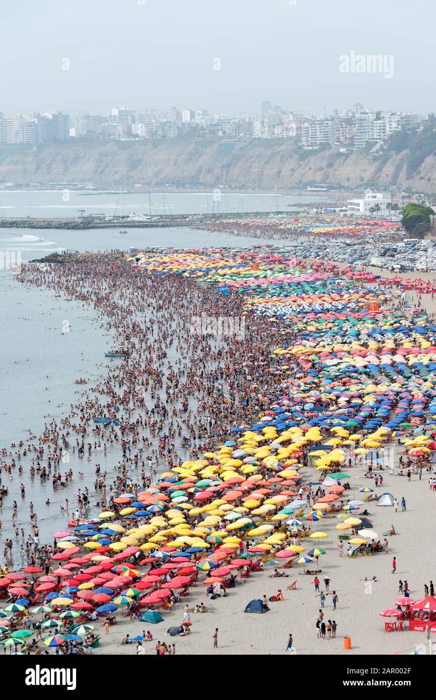 Crowded beach in Lima, Peru Stock Photo - Alamy