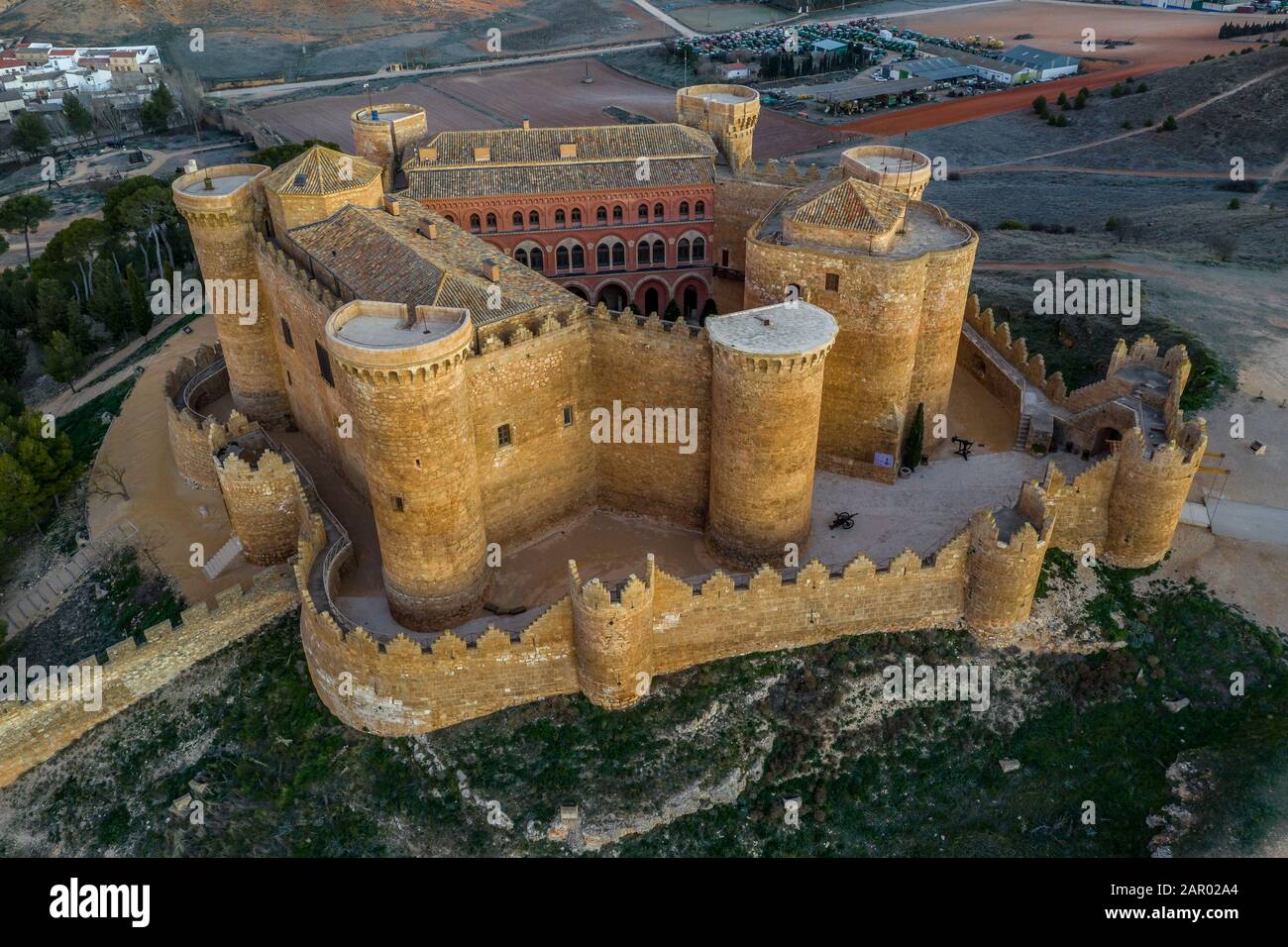 Aerial view of Belmonte castle in Cuenca Spain with circular walls, six ...
