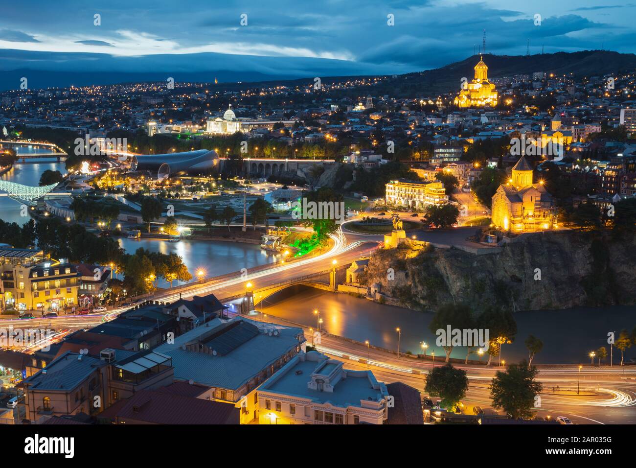 Tbilisi, Georgia. Evening Night View Of Georgian Capital Skyline ...