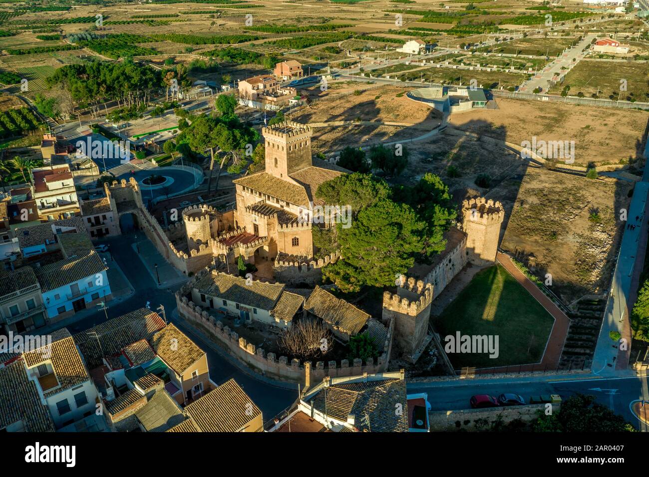Aerial morning view of fully restored Besano castle in Valencia with ...