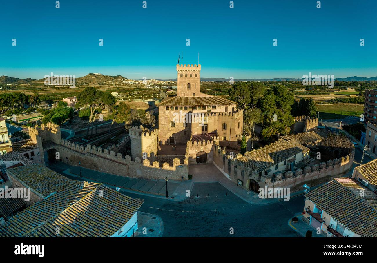 Aerial morning view of fully restored Besano castle in Valencia with ...