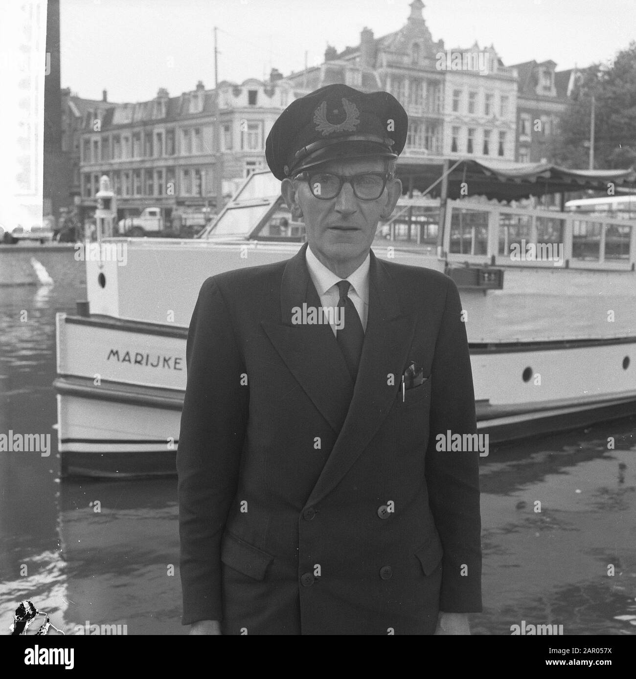 Captain of boat to calf Date: July 13, 1962 Keywords: captains Stock ...