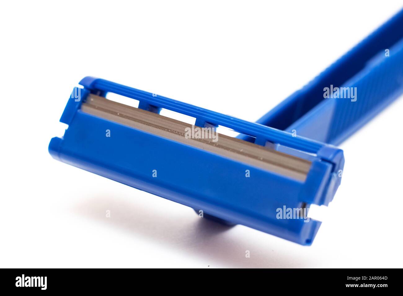 Blue razor blade on a white background Stock Photo - Alamy