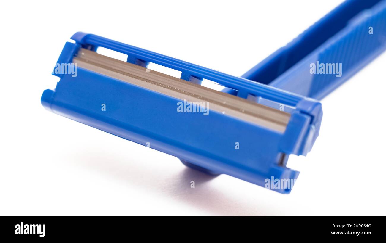 Blue razor blade isolated on a white background Stock Photo - Alamy