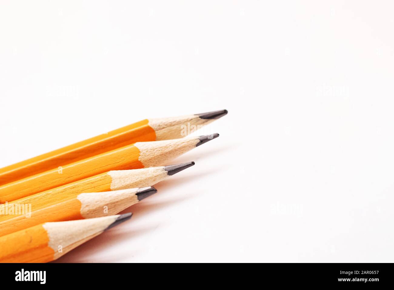 Four yellow pencils hi-res stock photography and images - Alamy
