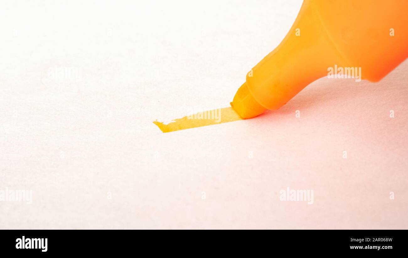 Orange marker on notepad hi-res stock photography and images - Alamy