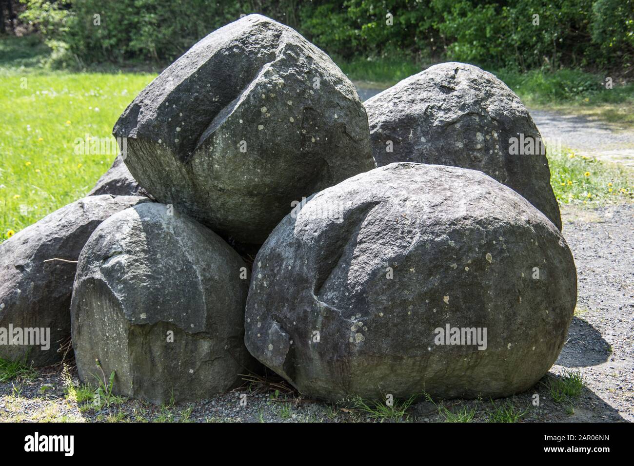 ancient basalt balls and columns stacked Stock Photo - Alamy