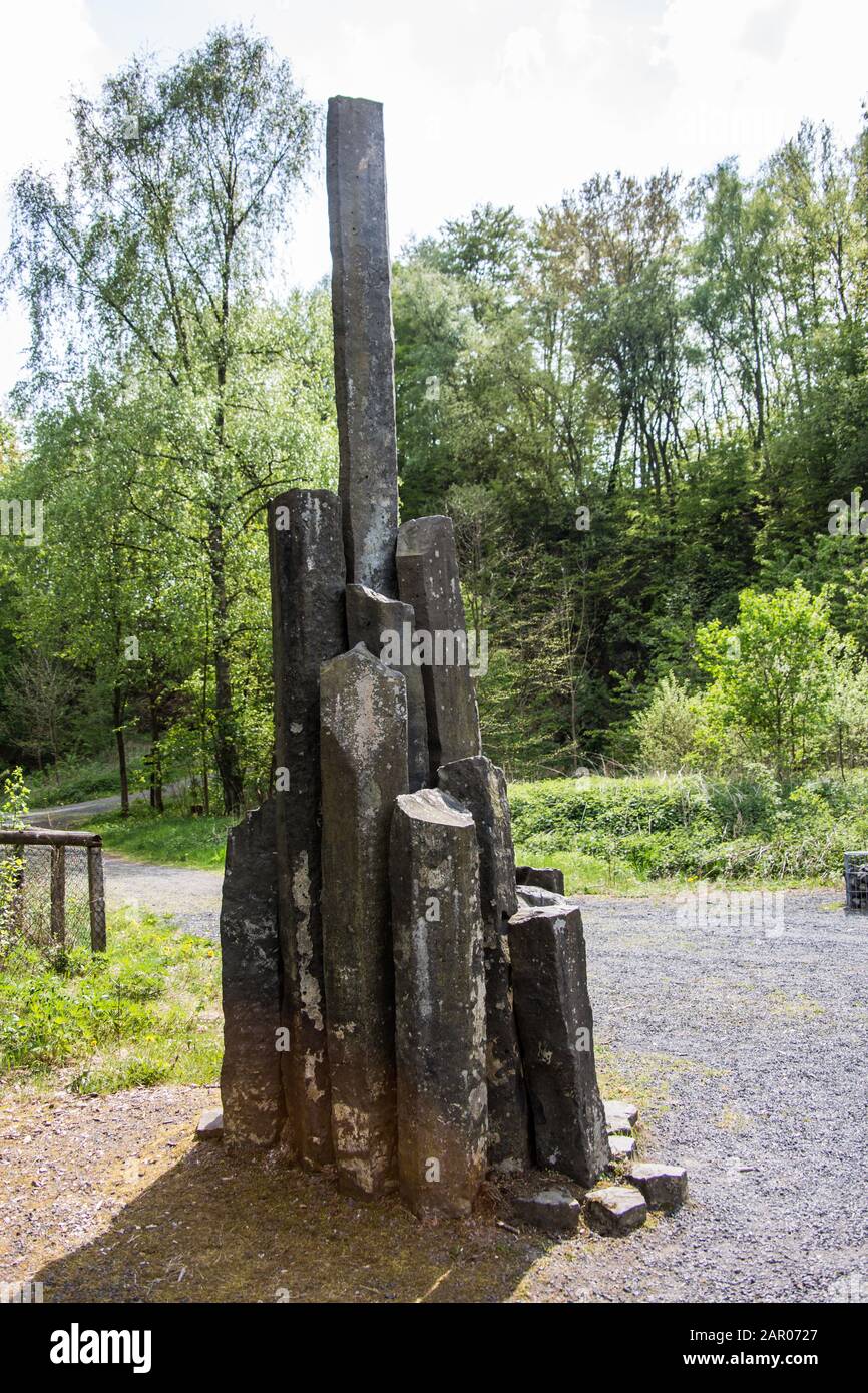 ancient basalt balls and columns stacked Stock Photo - Alamy