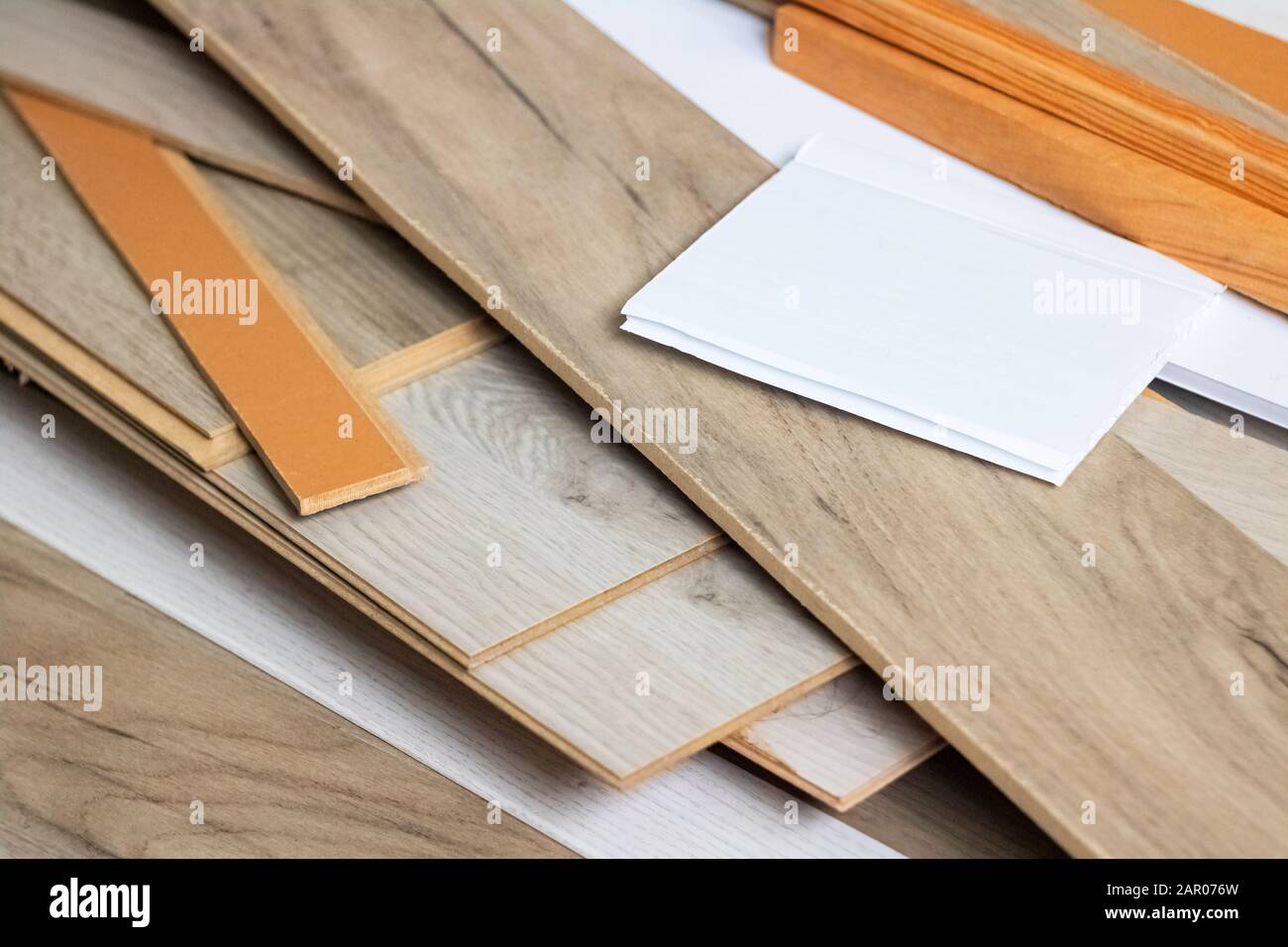 Wooden flooring boards close up, construction waste Stock Photo - Alamy