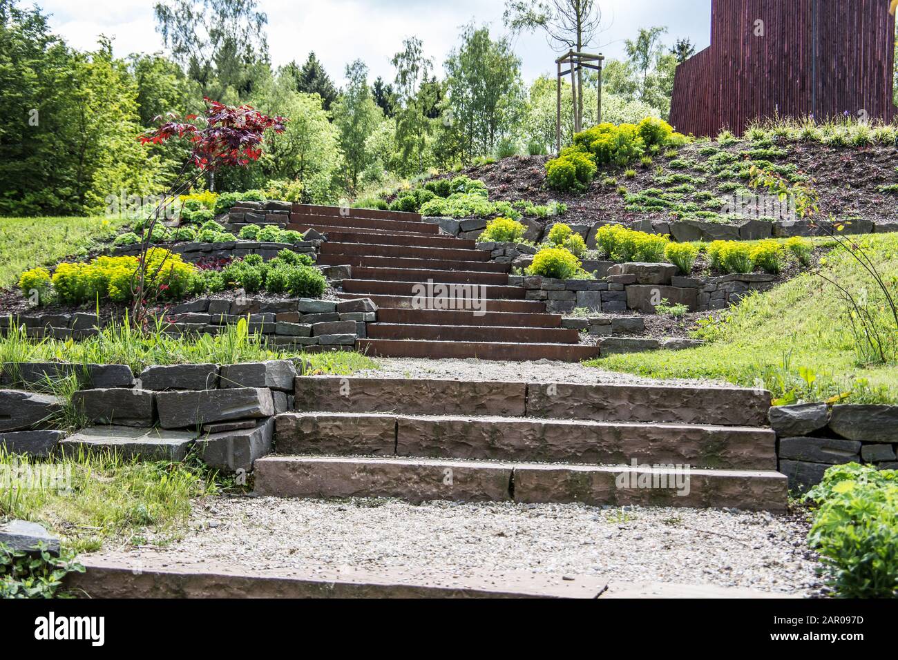 wide stone stairs in the rock garden park Stock Photo - Alamy