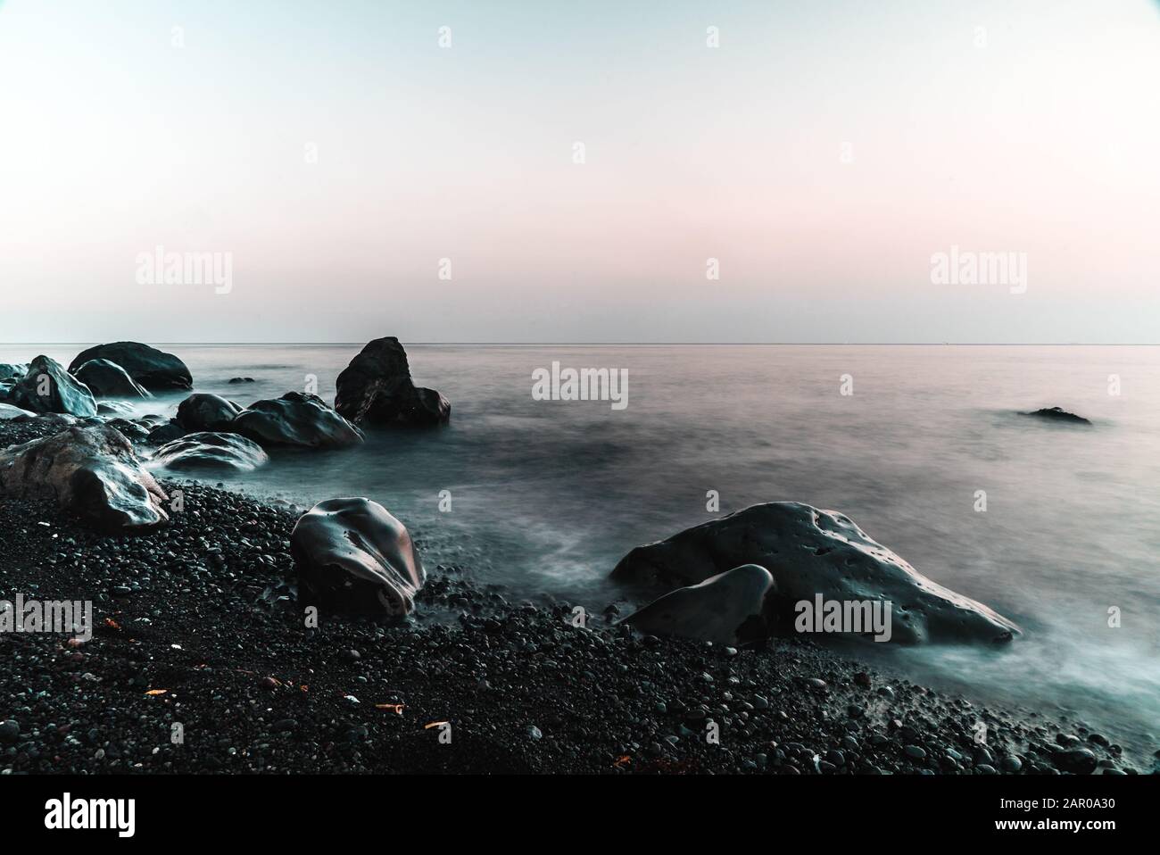 Dreamy ocean sunset crashing waves hi-res stock photography and images ...