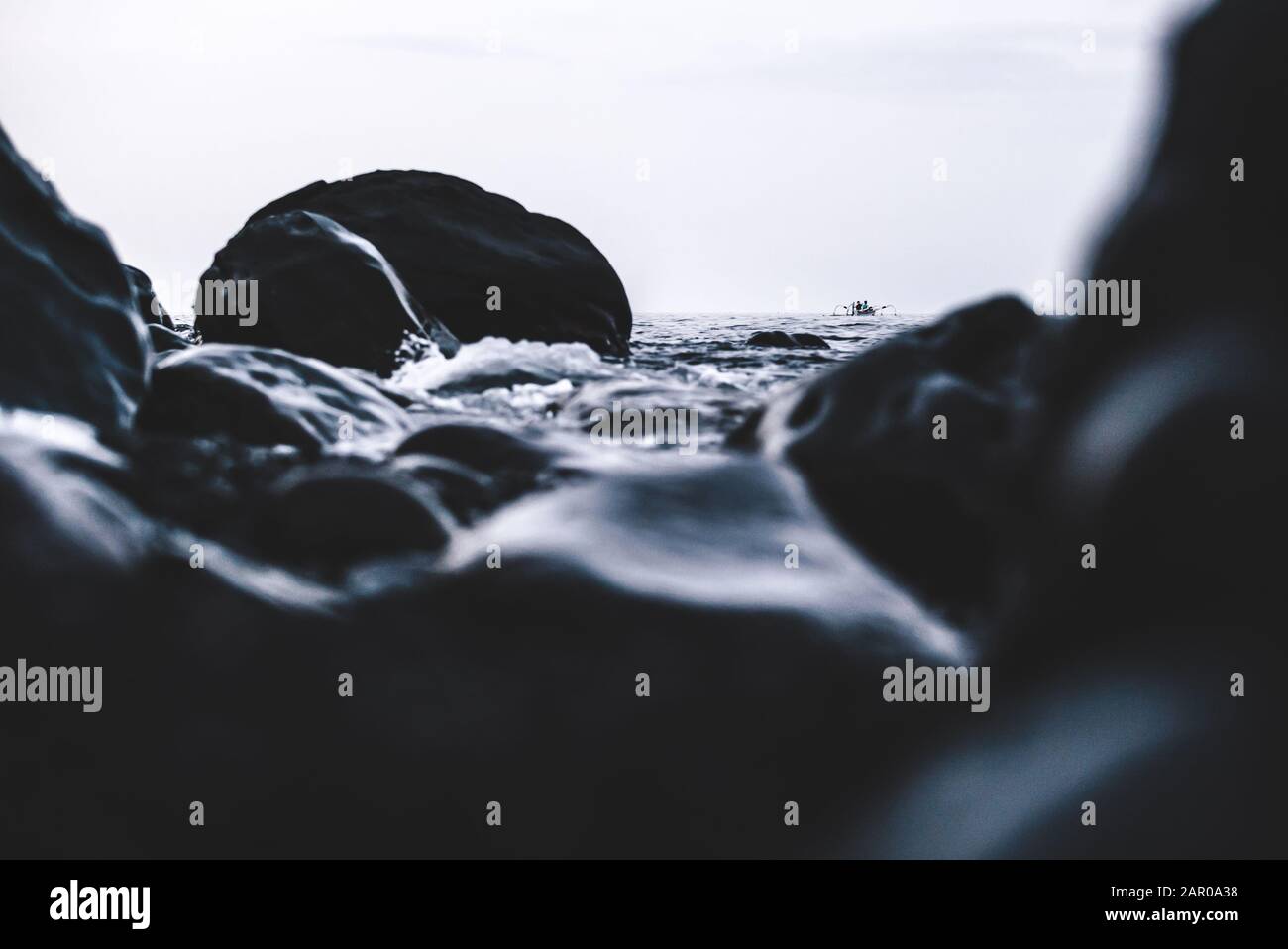 Small sea waves big rocks hi-res stock photography and images - Alamy