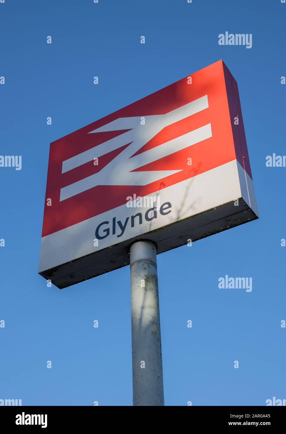 railway station sign in the east sussex village of glynde in the south ...