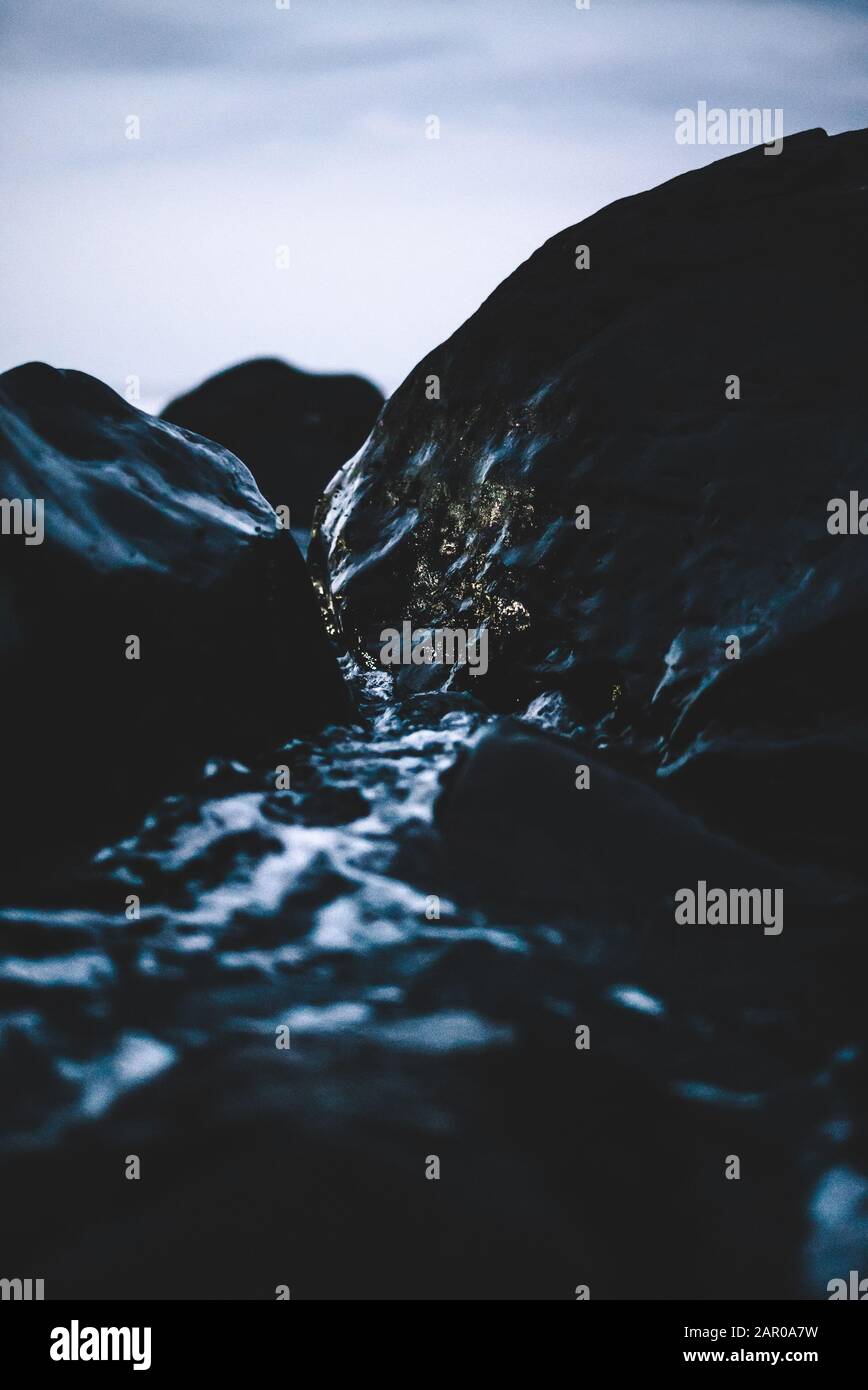 Mystic photo of water running over rocks Stock Photo - Alamy