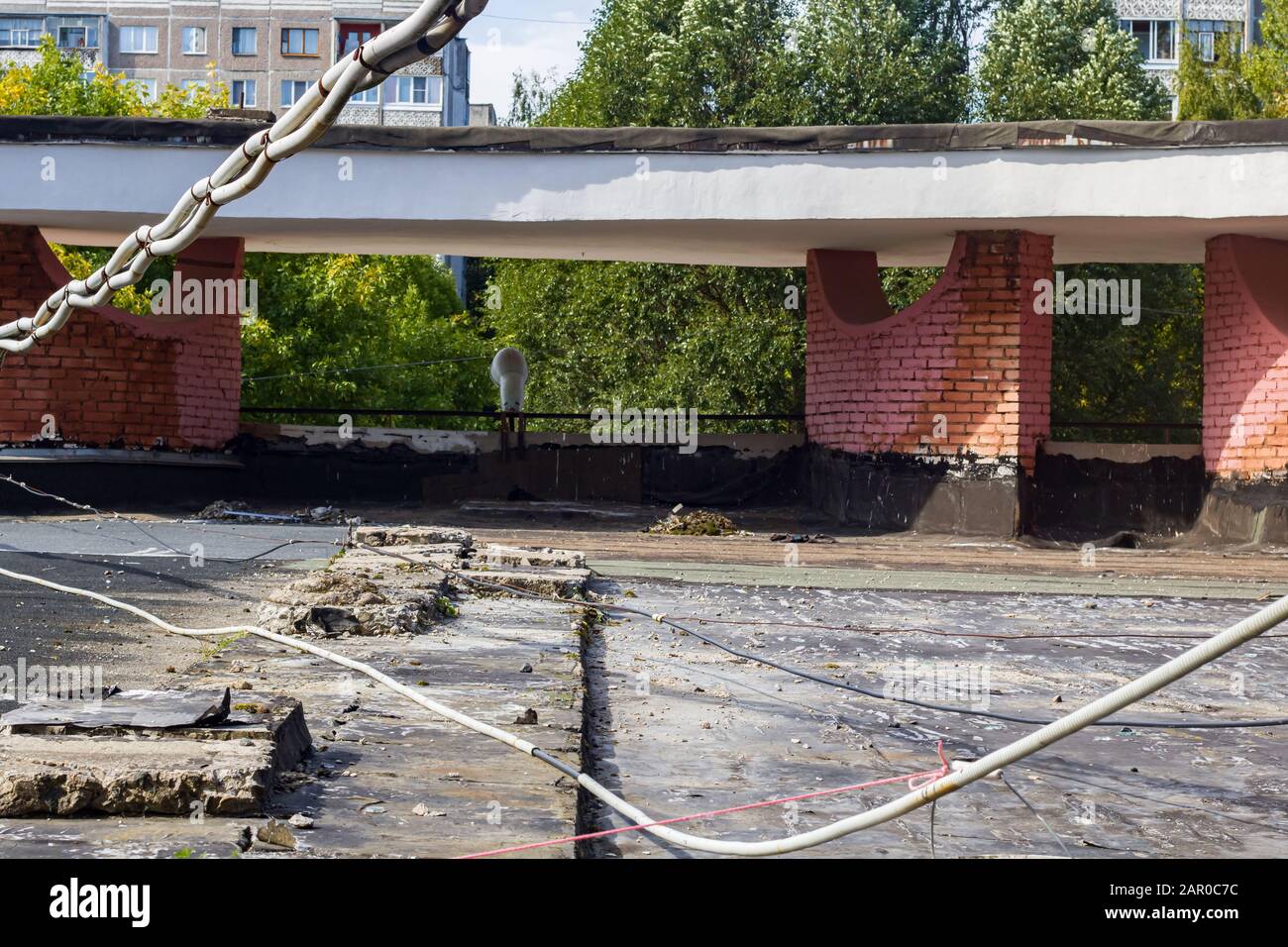 Electric wires on the flat roof of the building Stock Photo - Alamy