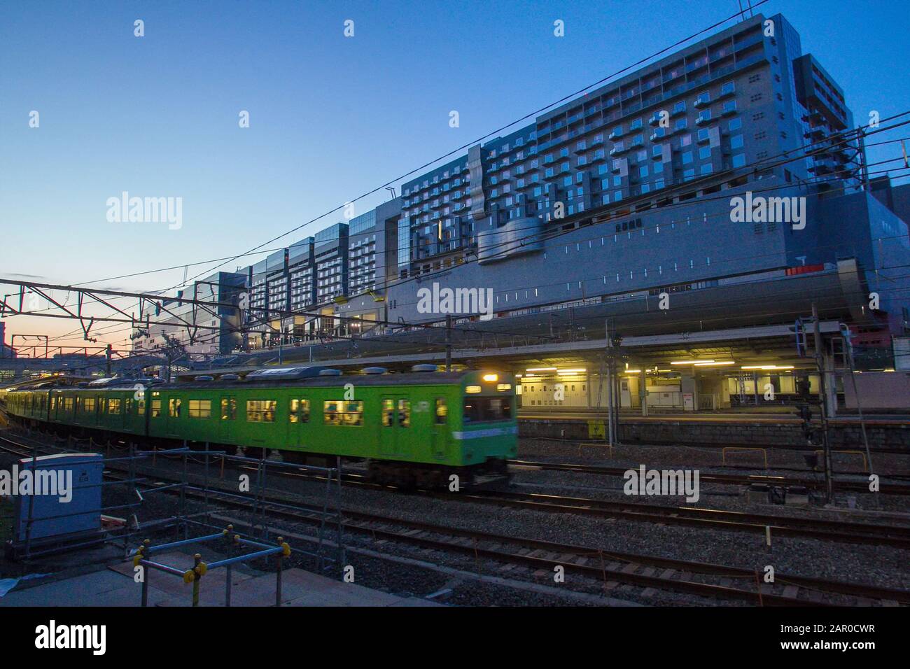 Green Local train green on Kyoto train station Stock Photo - Alamy
