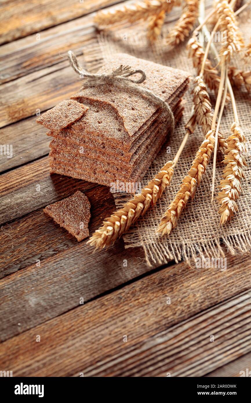 Crispbread cereal crackers wooden hi-res stock photography and images ...