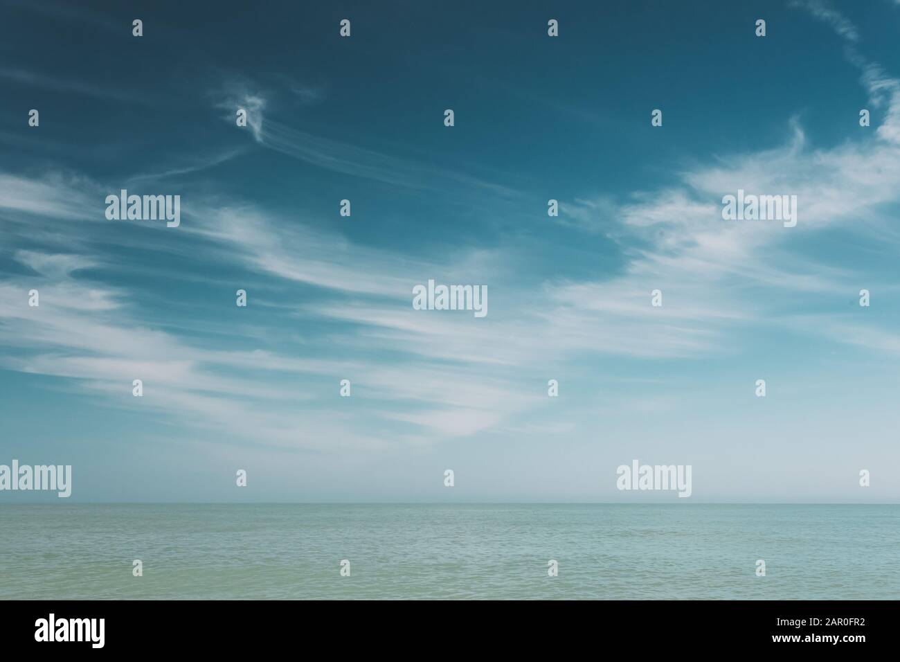 Blue Sky Over Calm Water Of Sea Ocean. Natural Background With Gently ...