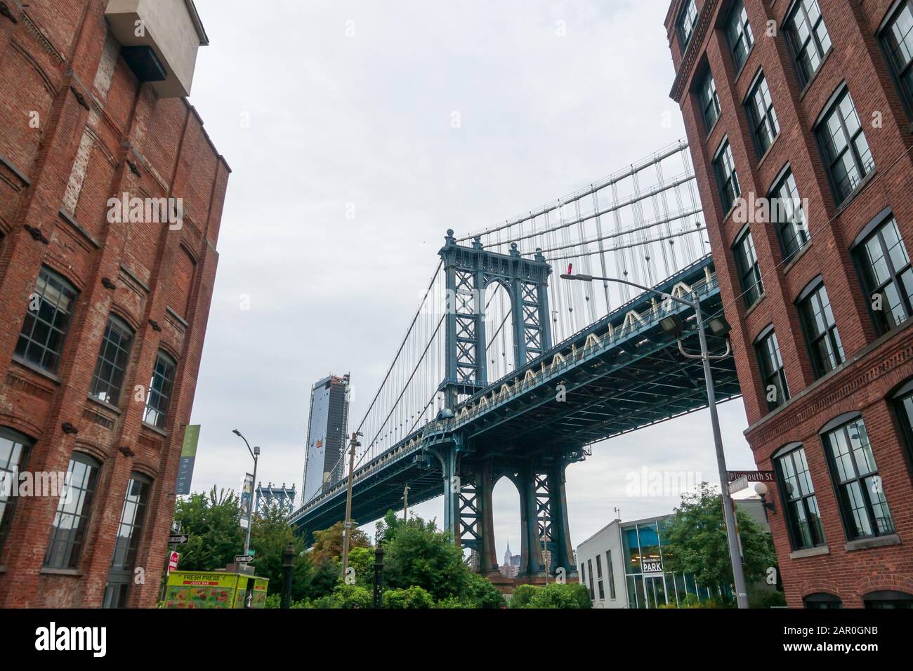 Pillar of Manhattan Bridge from alley in Dumbo district in Brooklyn ...