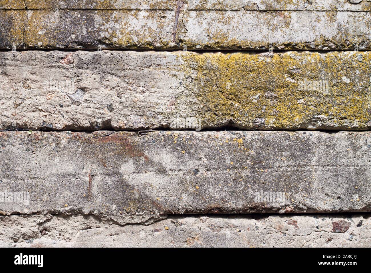 Old concrete blocks wall background closeup. Industrial background ...