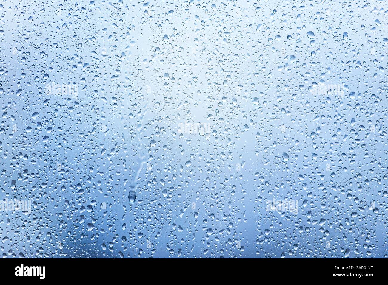 Window with Drops after heavy Rain, Water Drops on Glass as Background ...