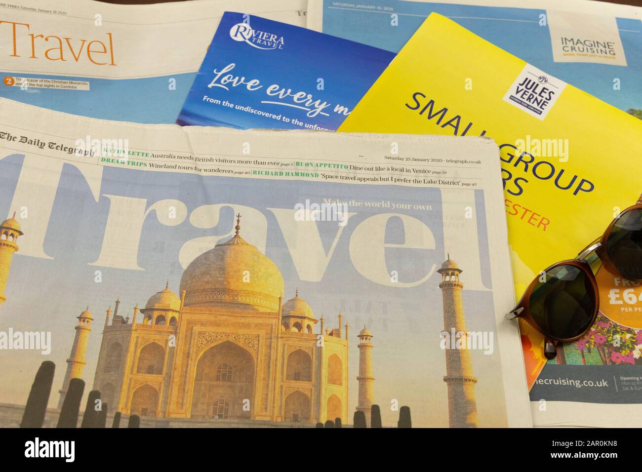 Travel pages of broadsheet papers from the UK Stock Photo - Alamy