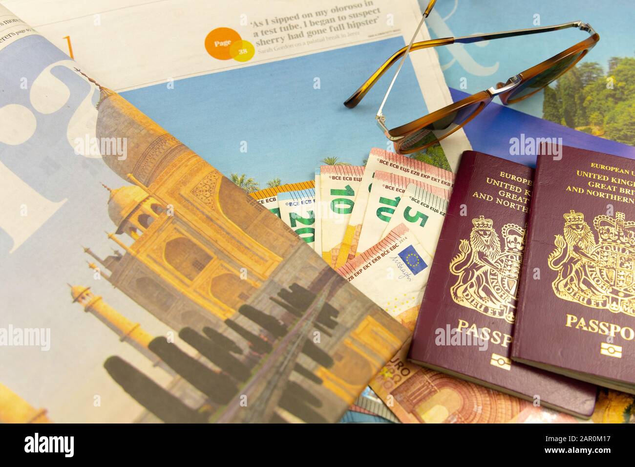 Travel pages of broadsheet papers from the UK Stock Photo - Alamy